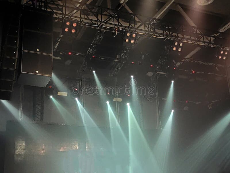 Professional Lighting Equipment on Stage Ceiling on Blurred Smoke ...
