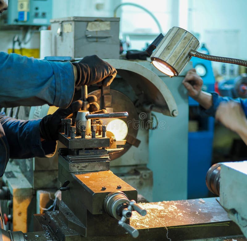 Professional Machinist : Man Operating Lathe Grinding Machine ...