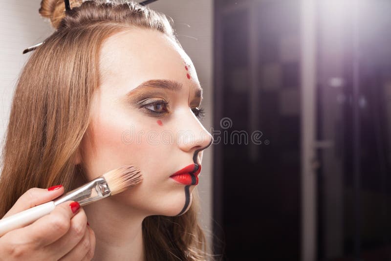 Make Up Woman Applying Foundation on a Model Stock Photo - Image of ...