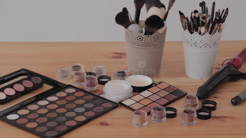 Professional Makeup Kit in a Makeup Studio on a Wooden Table. Stock ...