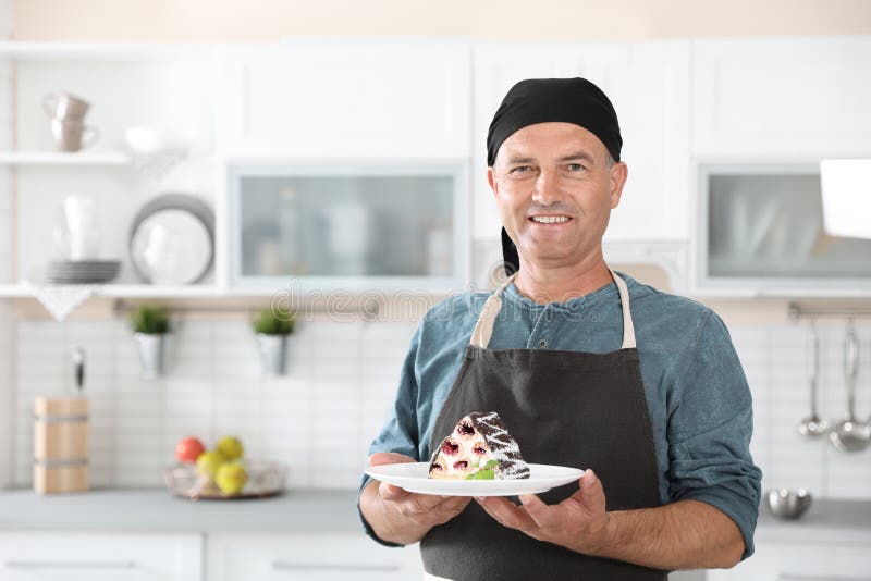 Professional Male Chef with Plate of Delicious Dessert Stock Photo ...