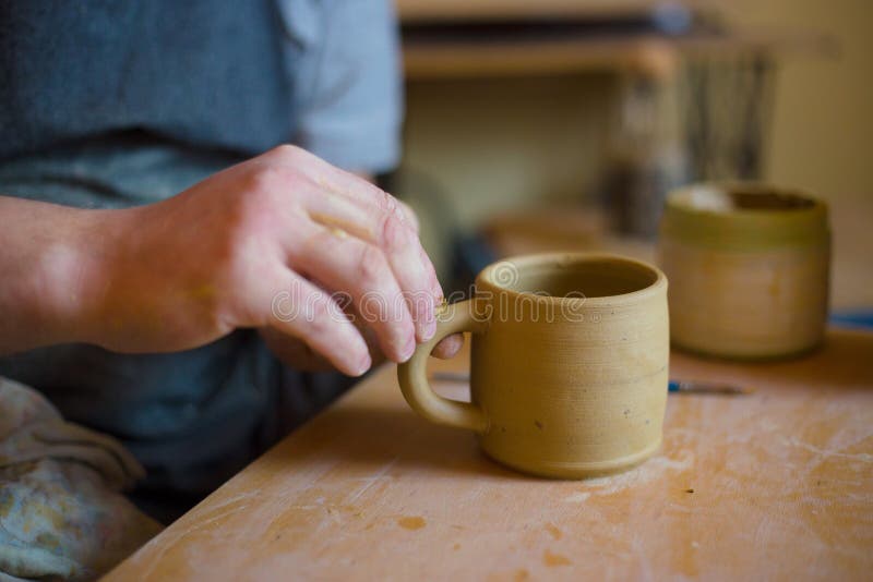 Professional Male Potter Working with Clay on Potter`s Wheel Stock ...