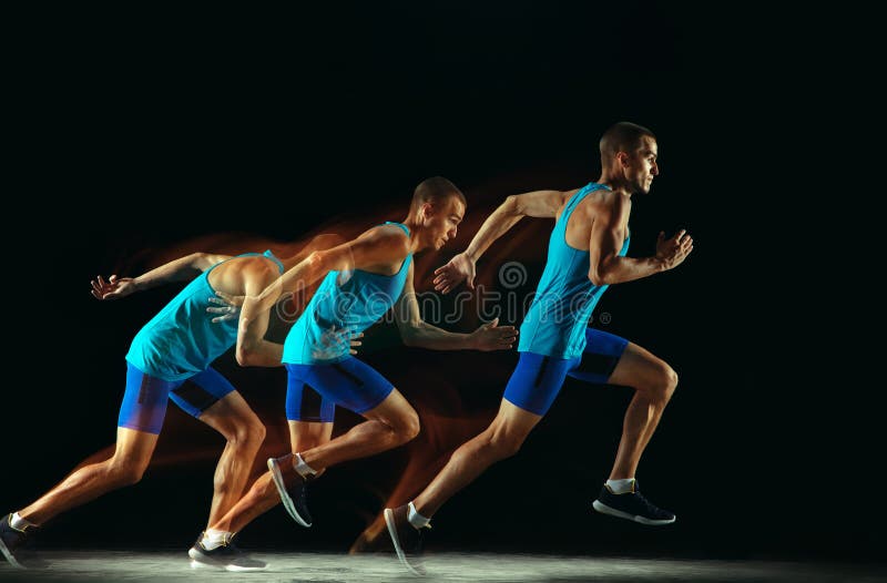 Professional Male Runner Training Isolated on Black Studio Background ...
