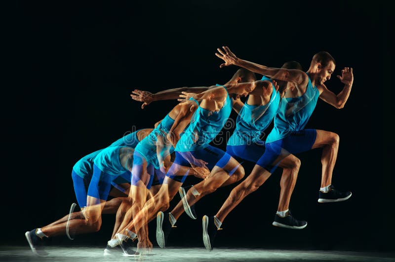 Professional Male Runner Training Isolated on Black Studio Background ...