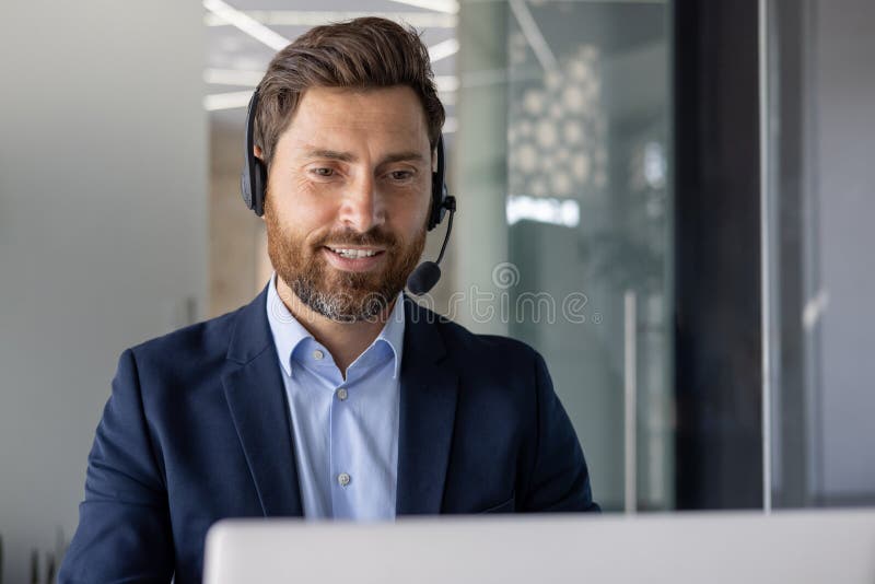 Professional Man with Headset Working at Modern Office Stock Photo ...