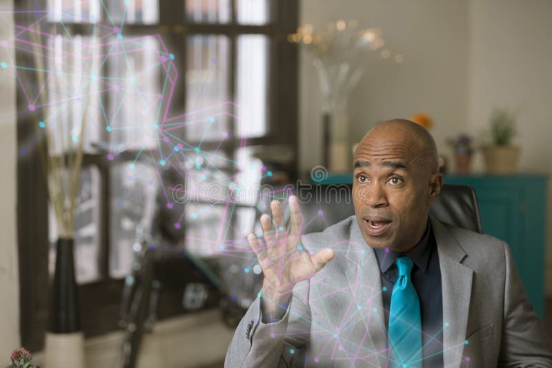 Professional Man Manipulating a Futuristic Network Graphic Stock Photo ...