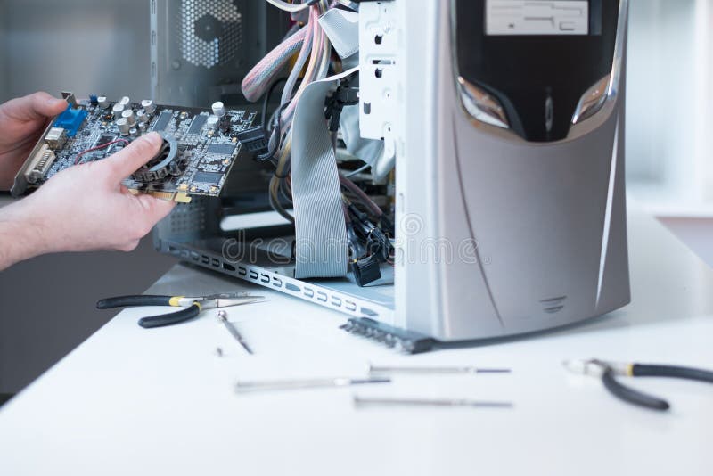 Professional Man Repairing and Assembling a Computer Stock Image ...