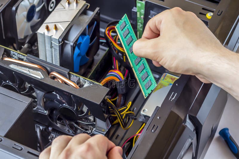 Professional Man are Repairing and Assembling a Computer Inside Stock ...