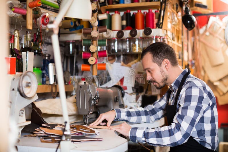 Professional Man Worker Working on Stitches for Belt Stock Photo ...