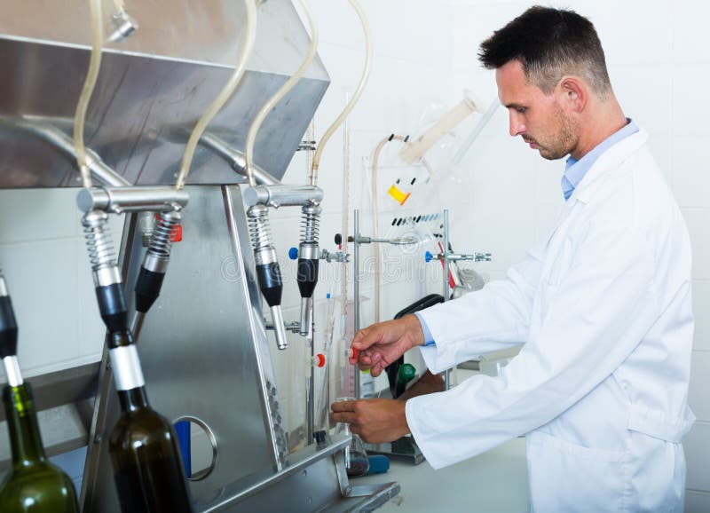 Professional Man Working on Quality of Products Stock Photo - Image of ...