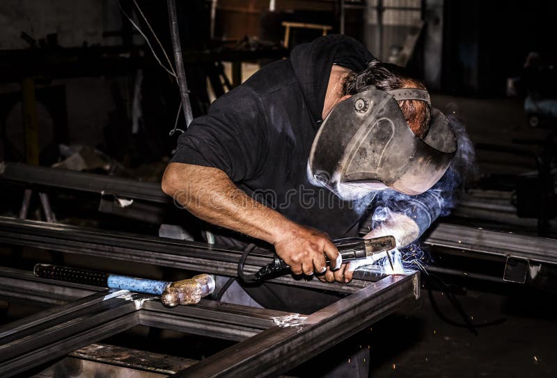 Professional Mask Protected Welder Man Working on Metal ...