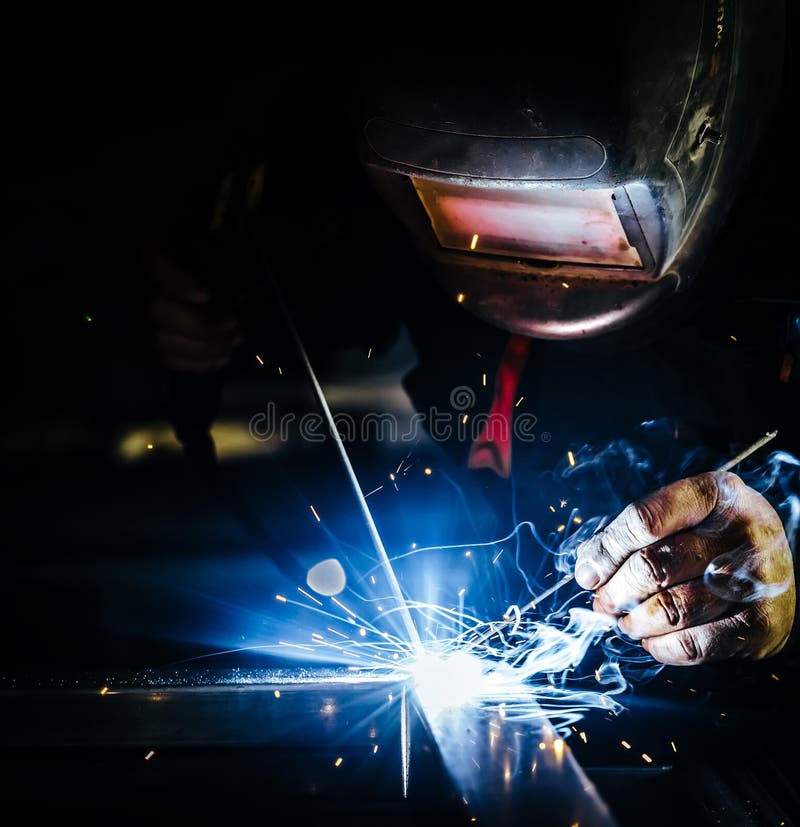 Professional Mask Protected Welder Man Working on Metal Welding ...