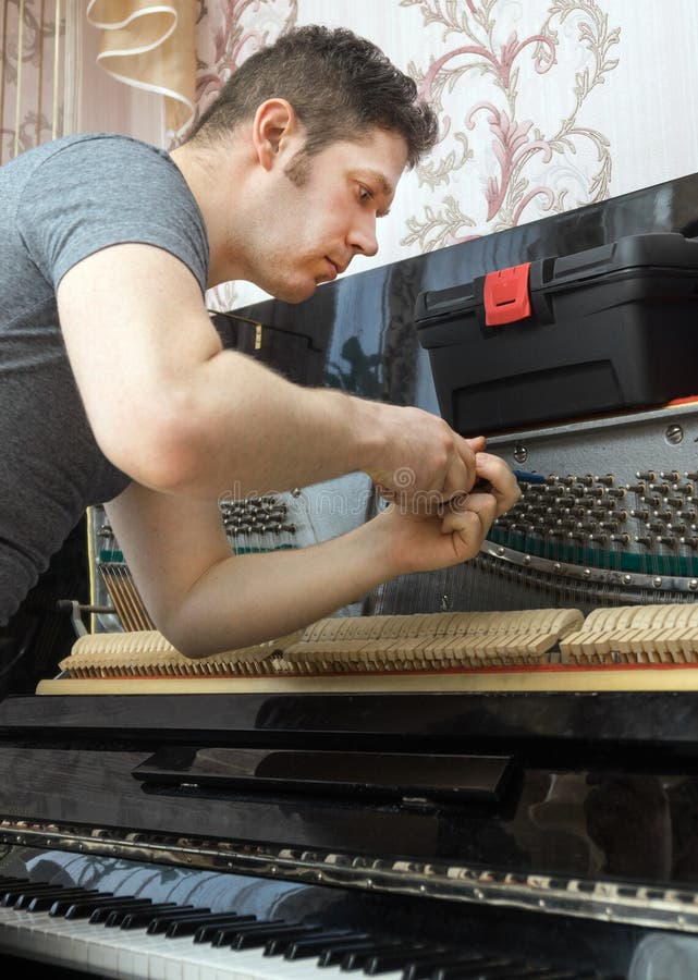 Professional Master Tuning the Piano Stock Photo - Image of male ...
