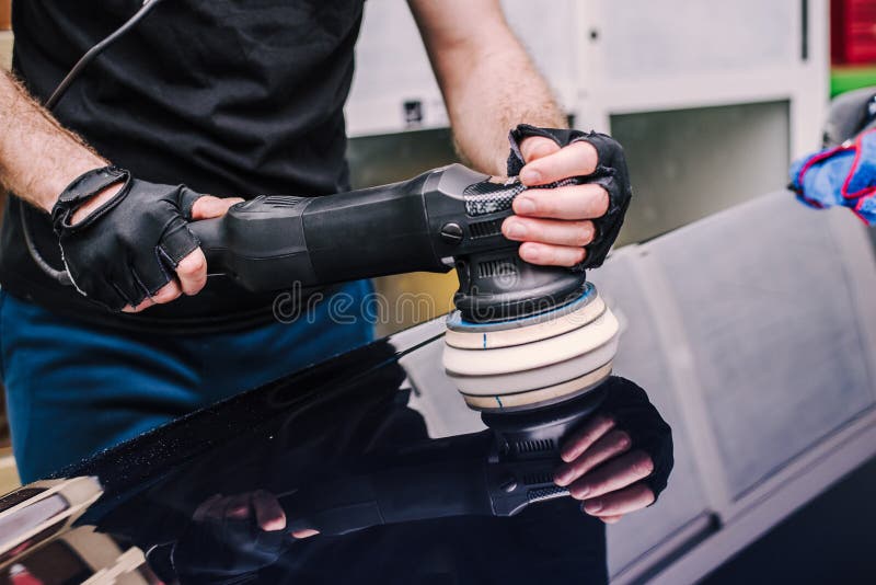 Professional Mechanic Using a Polisher To Shine a Car Stock Image ...