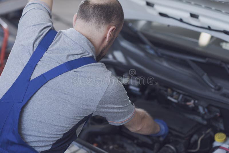 Professional Mechanic Checking the Car Engine Stock Photo - Image of ...