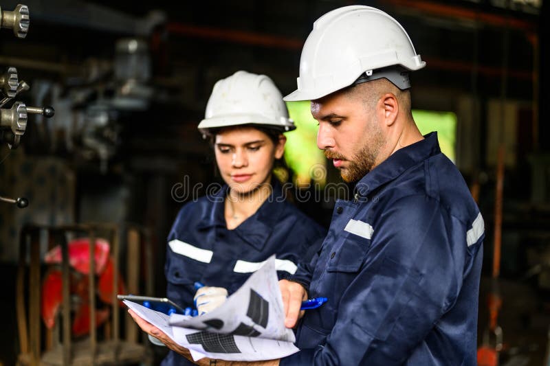 Professional Mechanical Engineer Team Checking and Repairing Engine ...