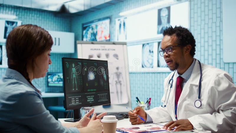 Professional Medic Analyzing X Ray Imaging and Test Findings in Office ...