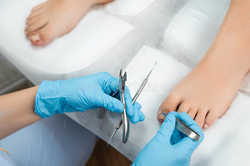 Professional Medical Pedicure Using Special Nail Instruments in the ...