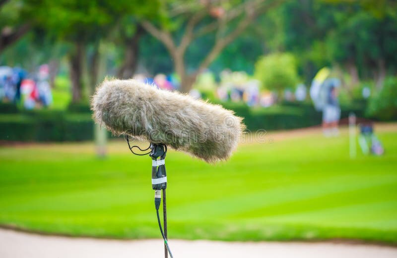 Professional Microphone on Green Grass Golf Course. Stock Photo - Image ...