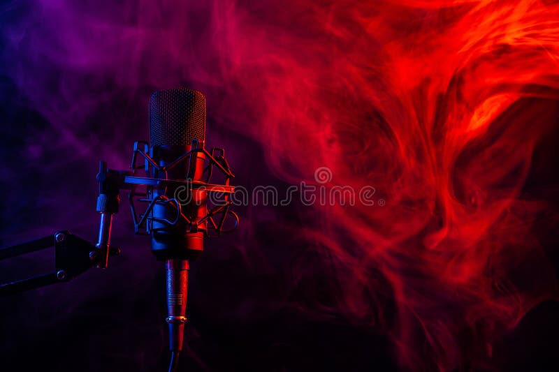 Professional Microphone in Red Blue Smoke on a Black Background. Stock ...