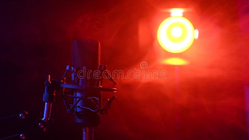 Professional Microphone in Red Smoke on a Black Background. Stock ...