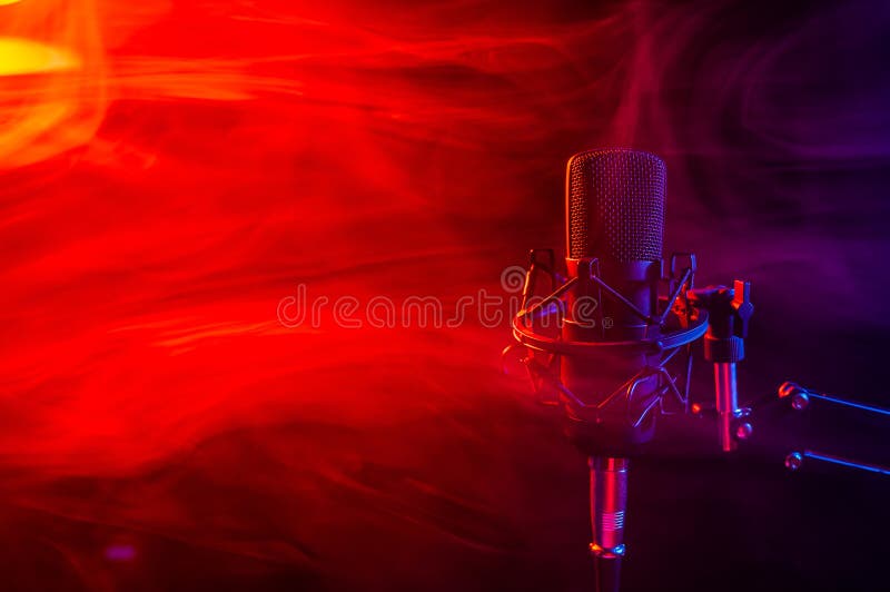 Professional Microphone in Red Smoke on a Black Background. Stock Image ...