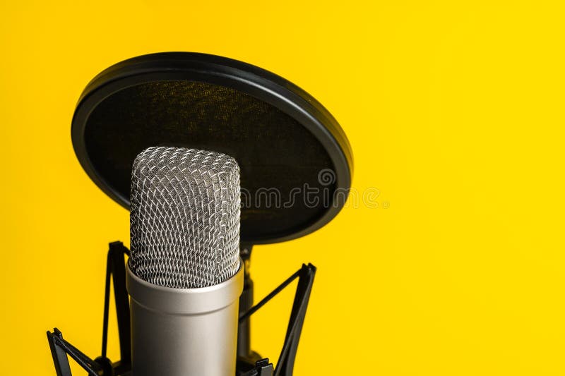 Professional Microphone Stand Over Yellow Studio Background Stock Image ...