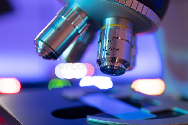 Professional Microscope and Glassware on Table in Chemistry Laboratory ...