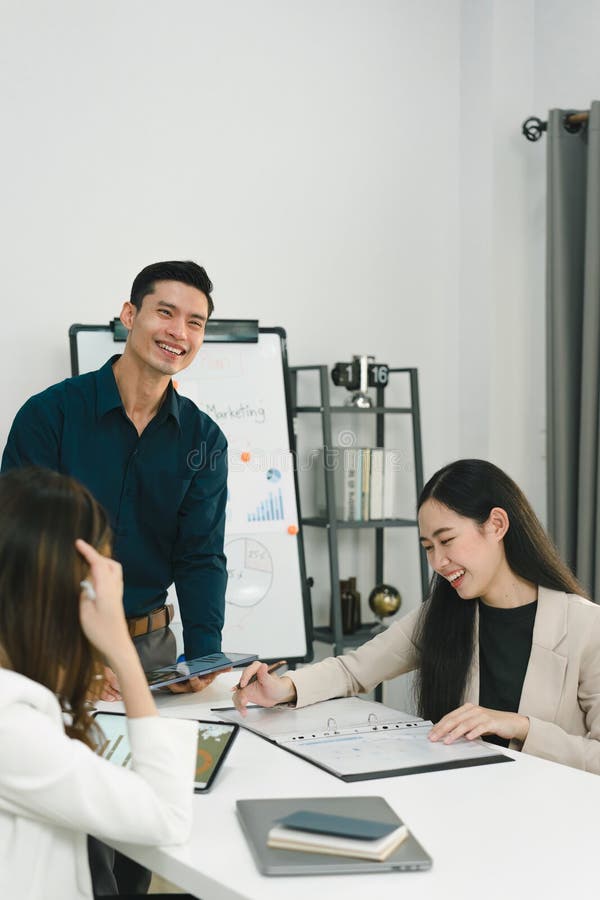 A Professional Millennial Asian Startup Brainstorming a New Project ...