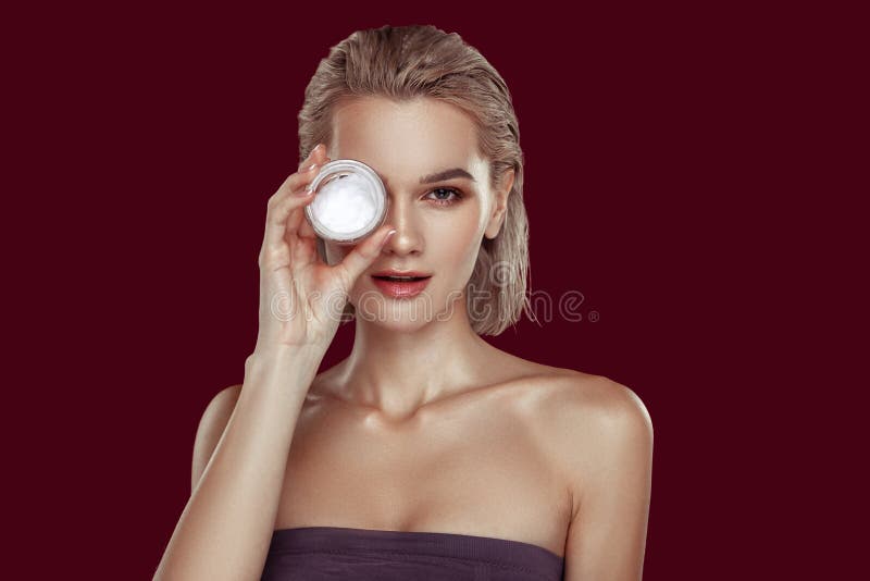 Professional Model with Little Pack of Cream Posing with it Stock Photo ...