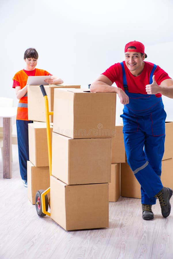The Professional Movers Doing Home Relocation Stock Photo - Image of ...