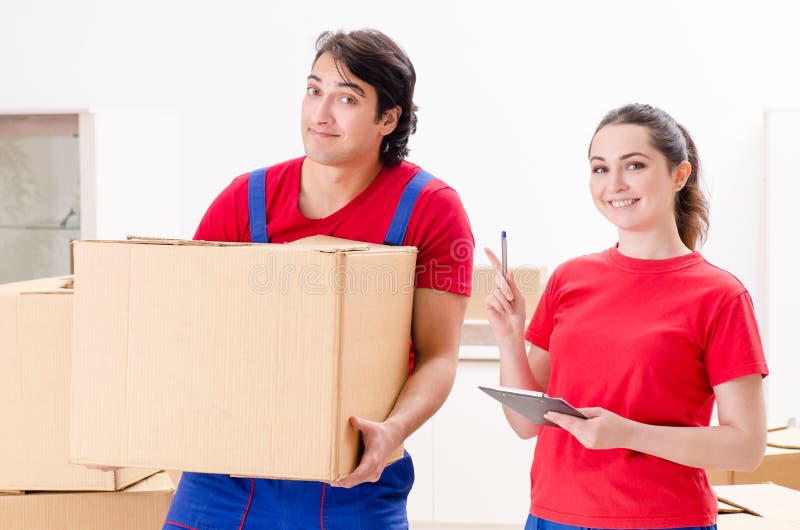 Professional Movers Doing Home Relocation Stock Photo - Image of ...