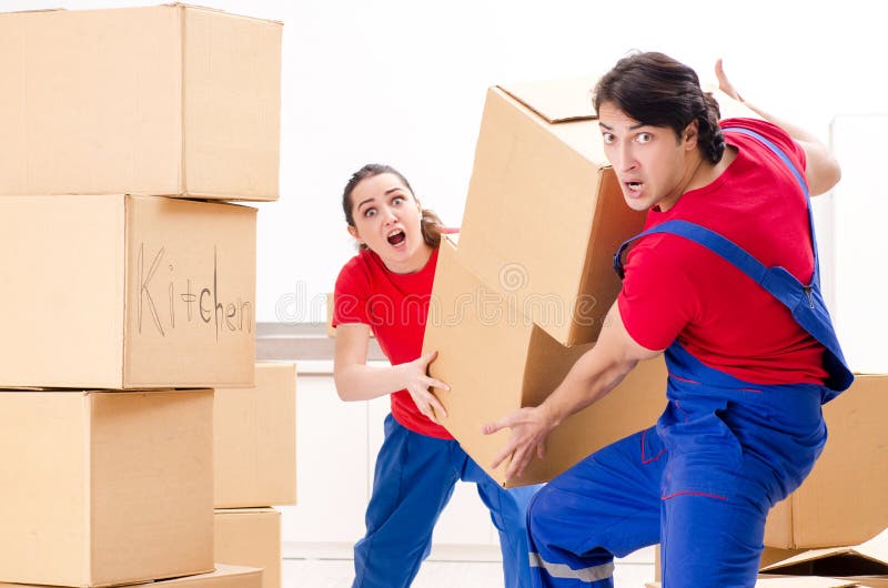 Professional Movers Doing Home Relocation Stock Photo - Image of heavy ...