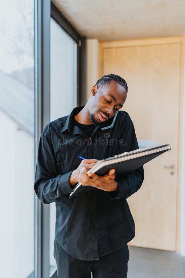Professional Multitasking Person with Notebook while Speaking on the ...