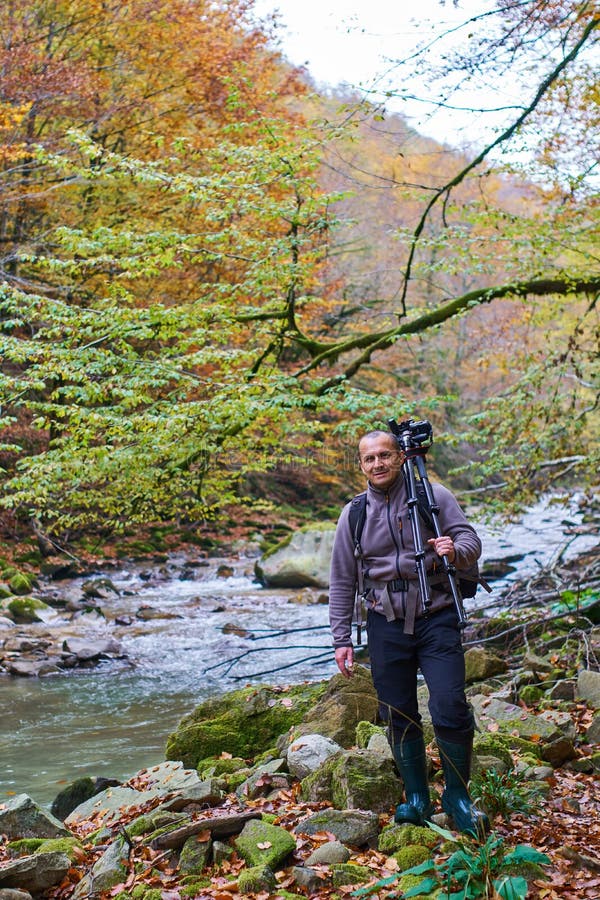 Professional Nature Photographer with Camera on Tripod Stock Image ...