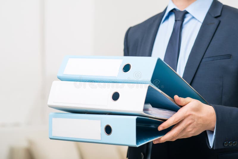Professional Office Worker Holding Folders Stock Image - Image of ...