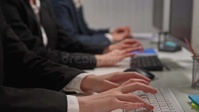 Office Workers Typing on Keyboards in a Modern Workplace Stock Footage ...
