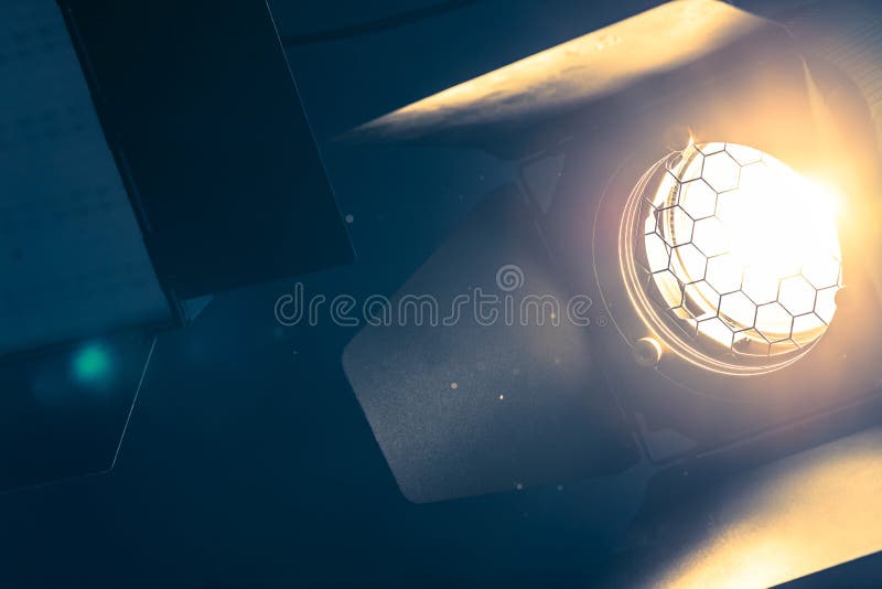 Professional Orange Studio Spotlight in a TV Studio. Lighted Dust ...