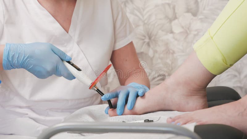 Professional Orthopedist Installs a Titanium Thread Using Electronic UV ...