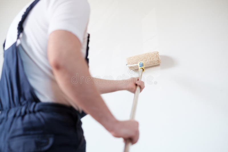 Professional Painter Worker is Painting One Wall Stock Image - Image of ...