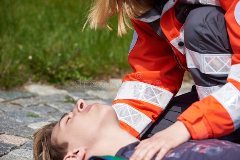 Professional Paramedic Talking and Showing CPR Stock Image - Image of ...