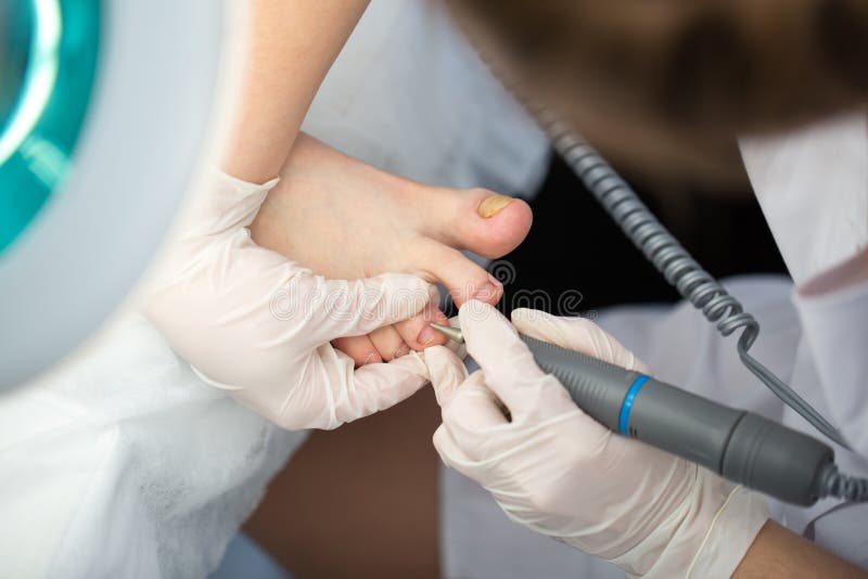 Professional Pedicure Master Making Pedicure in Salon. Stock Photo ...