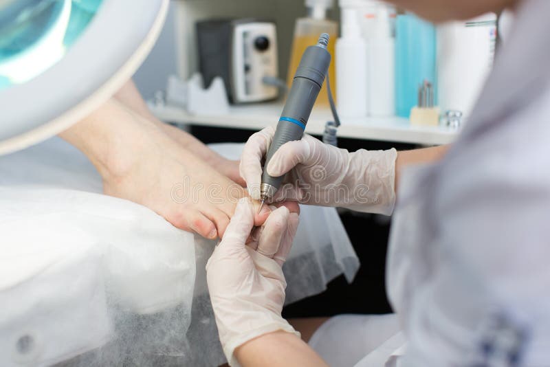 Professional Pedicure Master Making Pedicure in Salon. Stock Image ...
