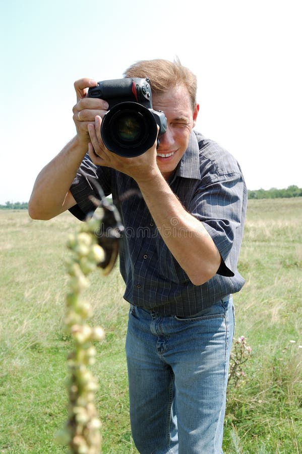 Professional Photographer stock photo. Image of photographer - 12558138