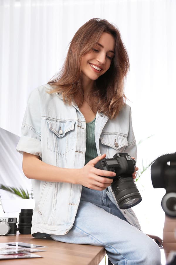Professional Photographer with Camera Working in Office Stock Photo ...