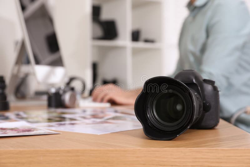 Professional Photographer Working at Table in Office Stock Image ...
