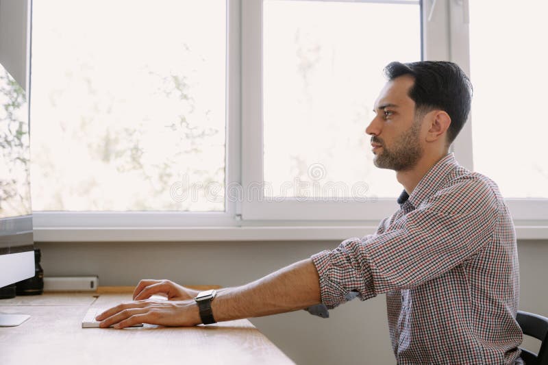 Professional Photographer Works in Photo Editing App. Software on His ...