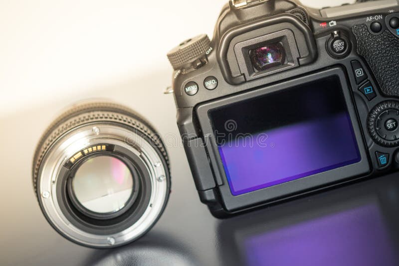 Professional Photographing: Back View of a Professional Reflex Camera ...