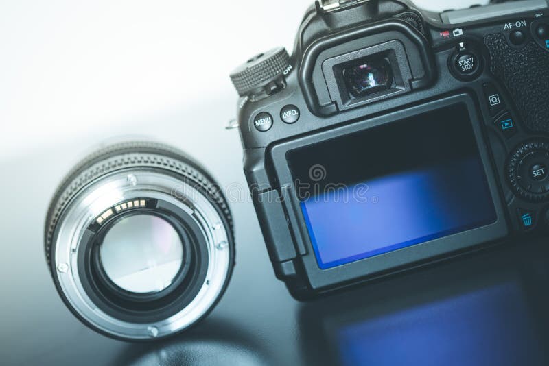 Professional Photographing: Back View of a Professional Reflex Camera ...