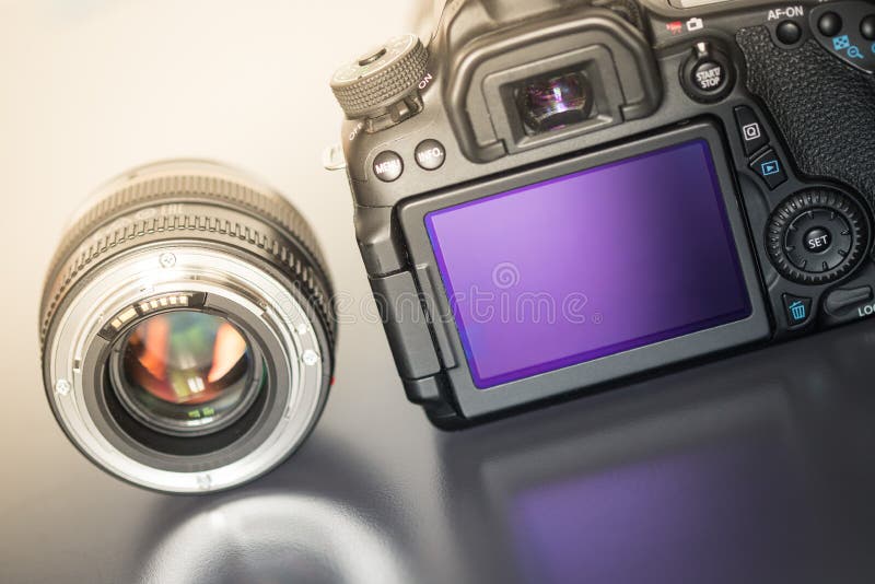 Professional Photographing: Back View of a Professional Reflex Camera ...